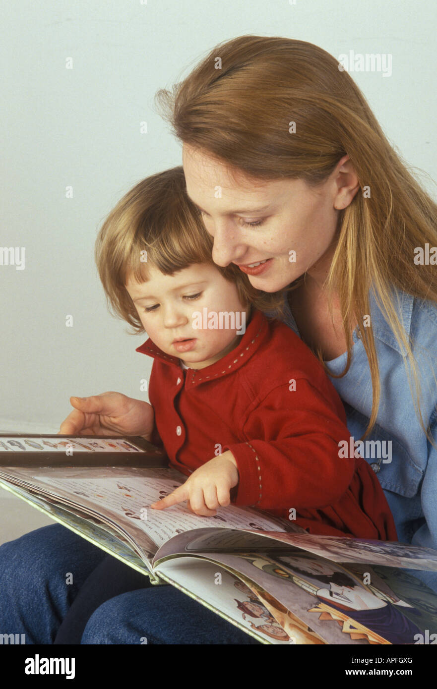 mother and child reading together Stock Photo - Alamy