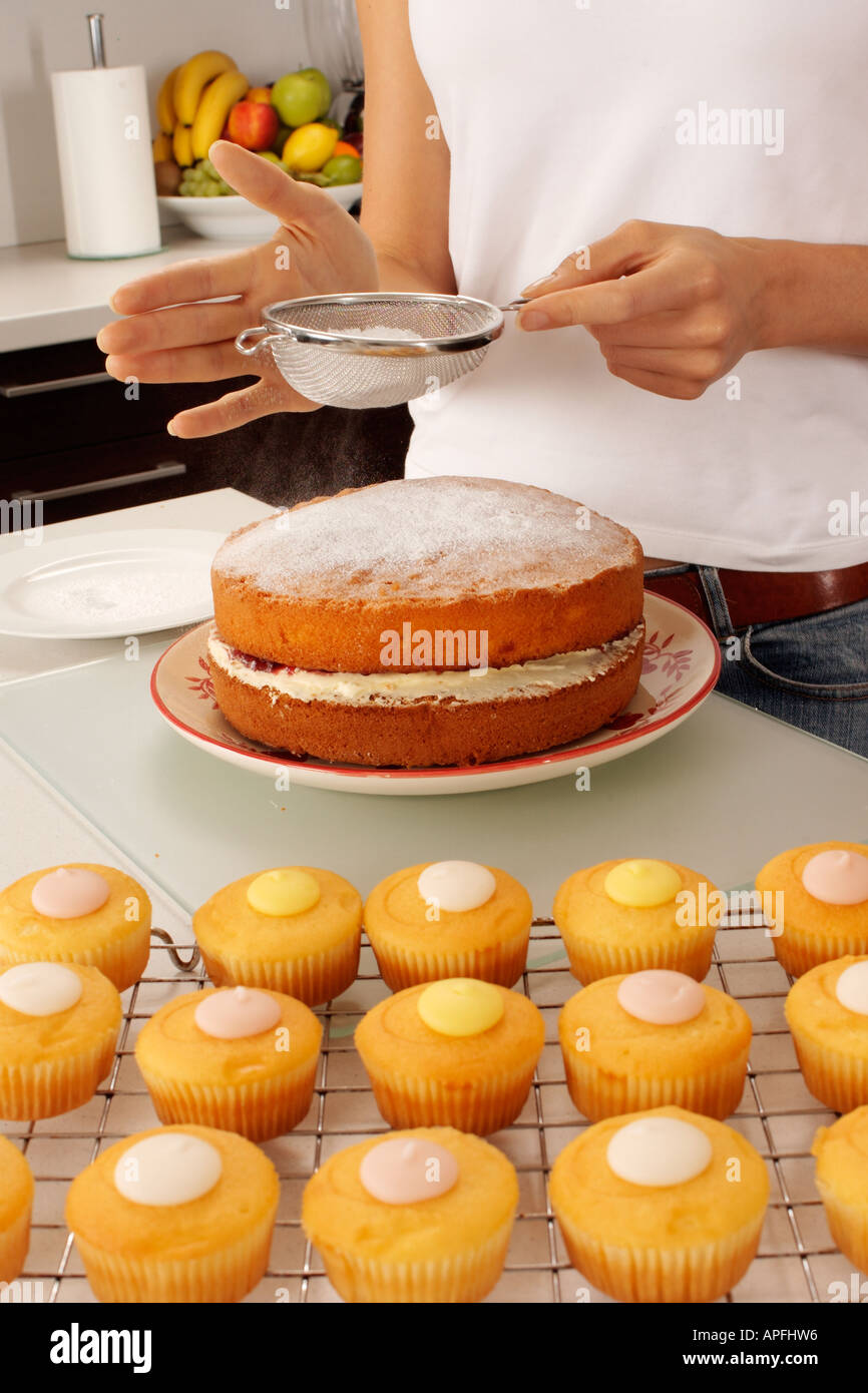 Young woman baking cup cakes hi-res stock photography and images - Alamy