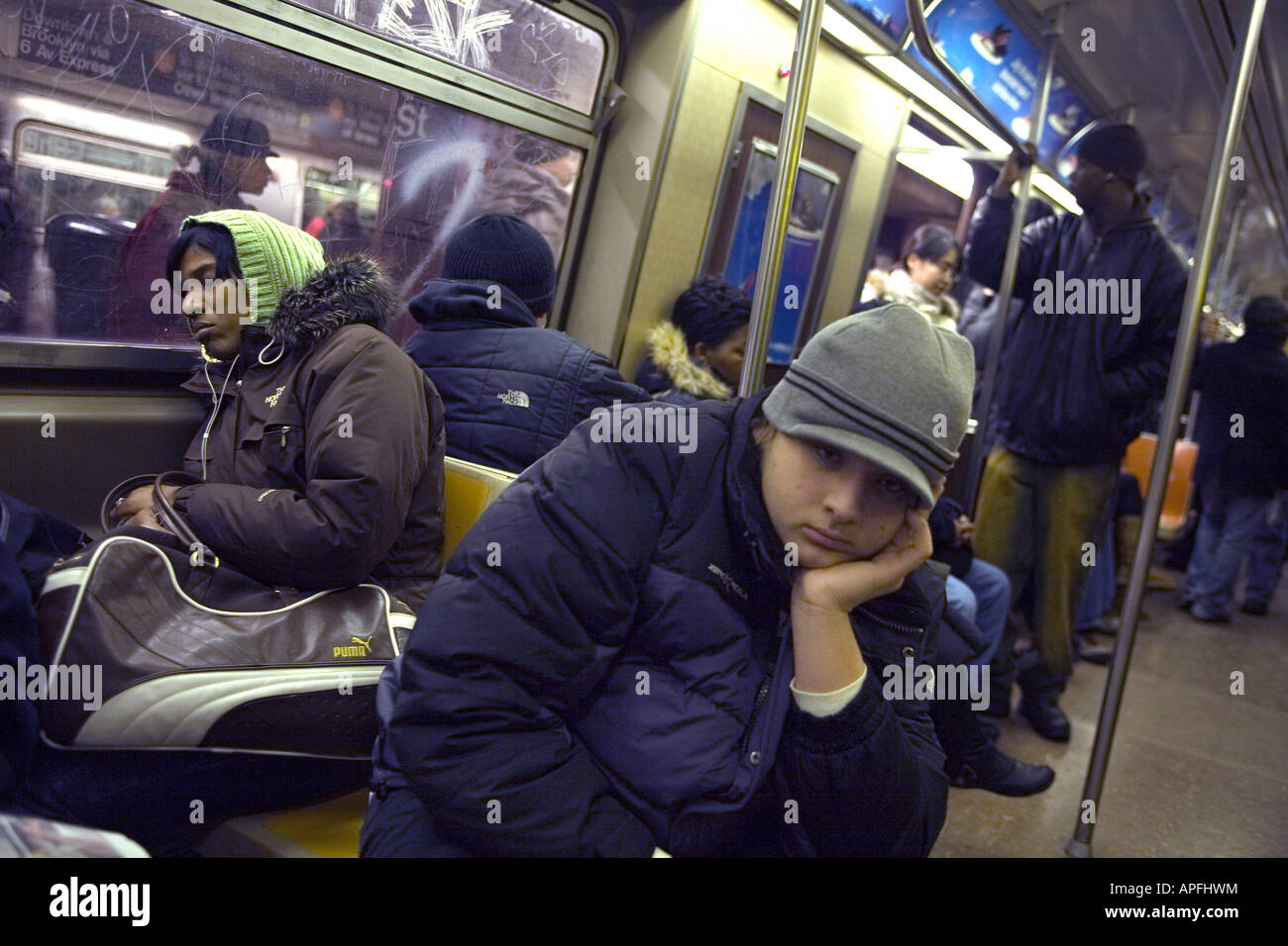 Riders on the subway in New York City Stock Photo - Alamy