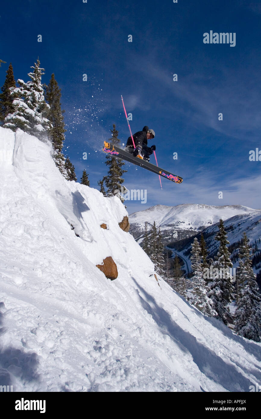 Skier jumping cliff Stock Photo - Alamy