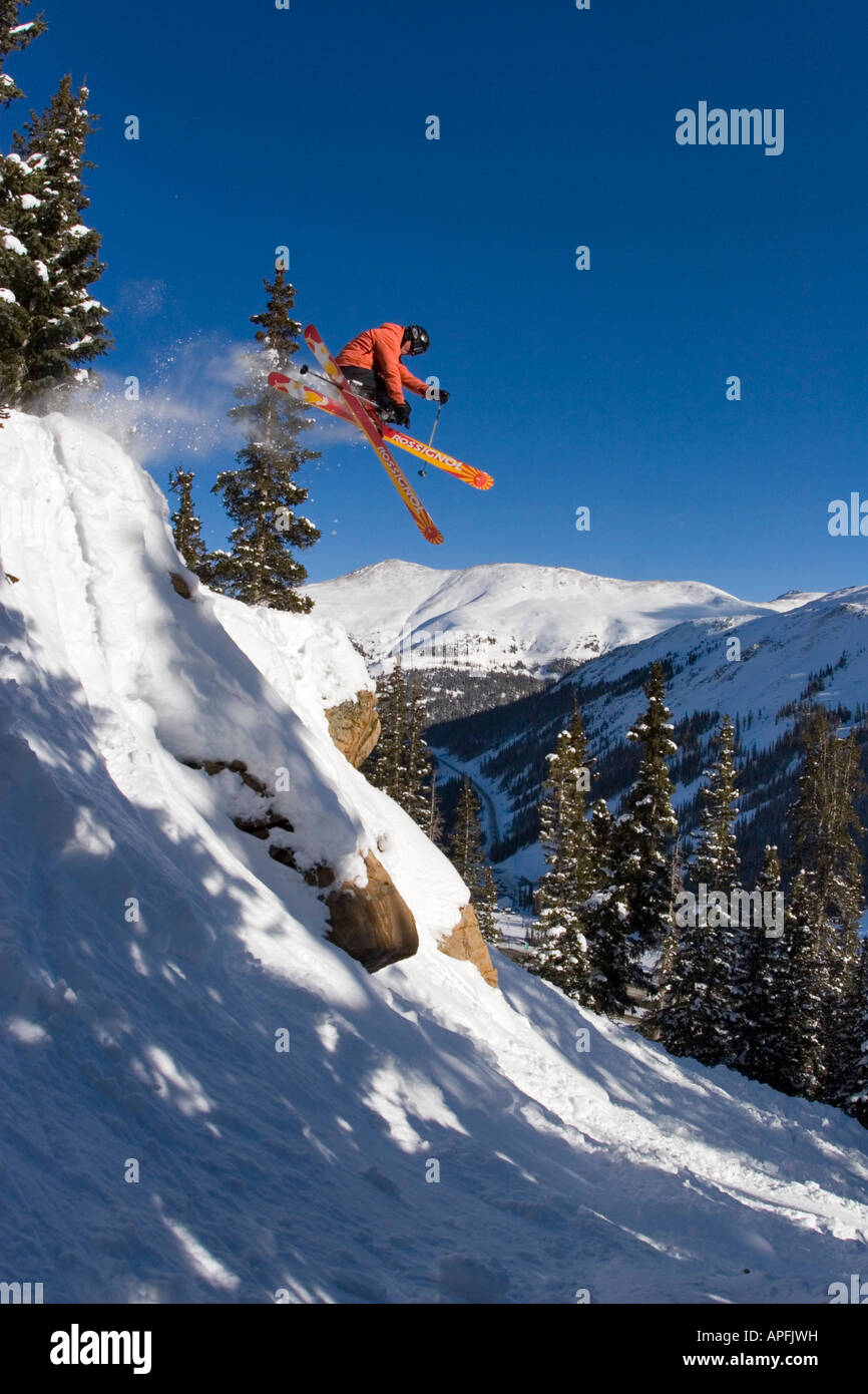 Male telemark skier jumping off a cliff in the Colorado mountains Stock ...