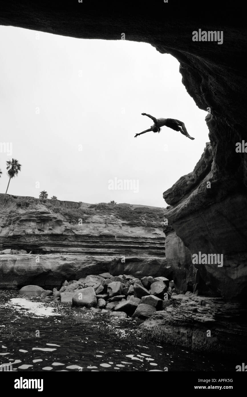 Man Cliff Diving Stock Photo - Alamy