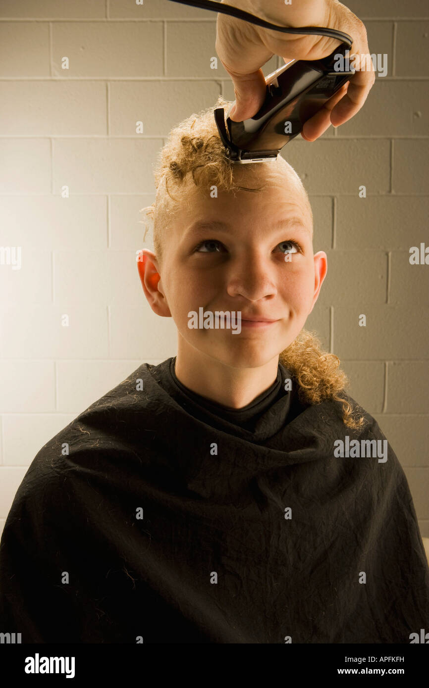 Getting hair buzzed off Stock Photo - Alamy
