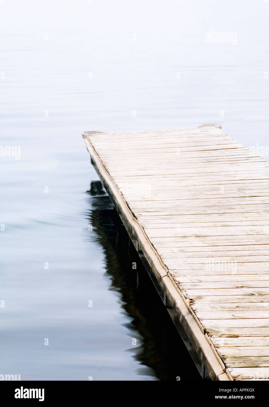 Dock on water Stock Photo - Alamy