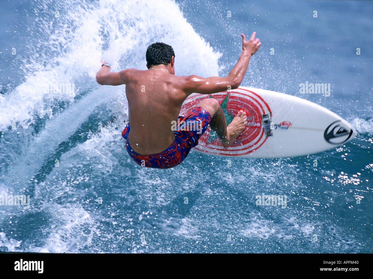 SURFING ACTION MALDIVES Stock Photo - Alamy