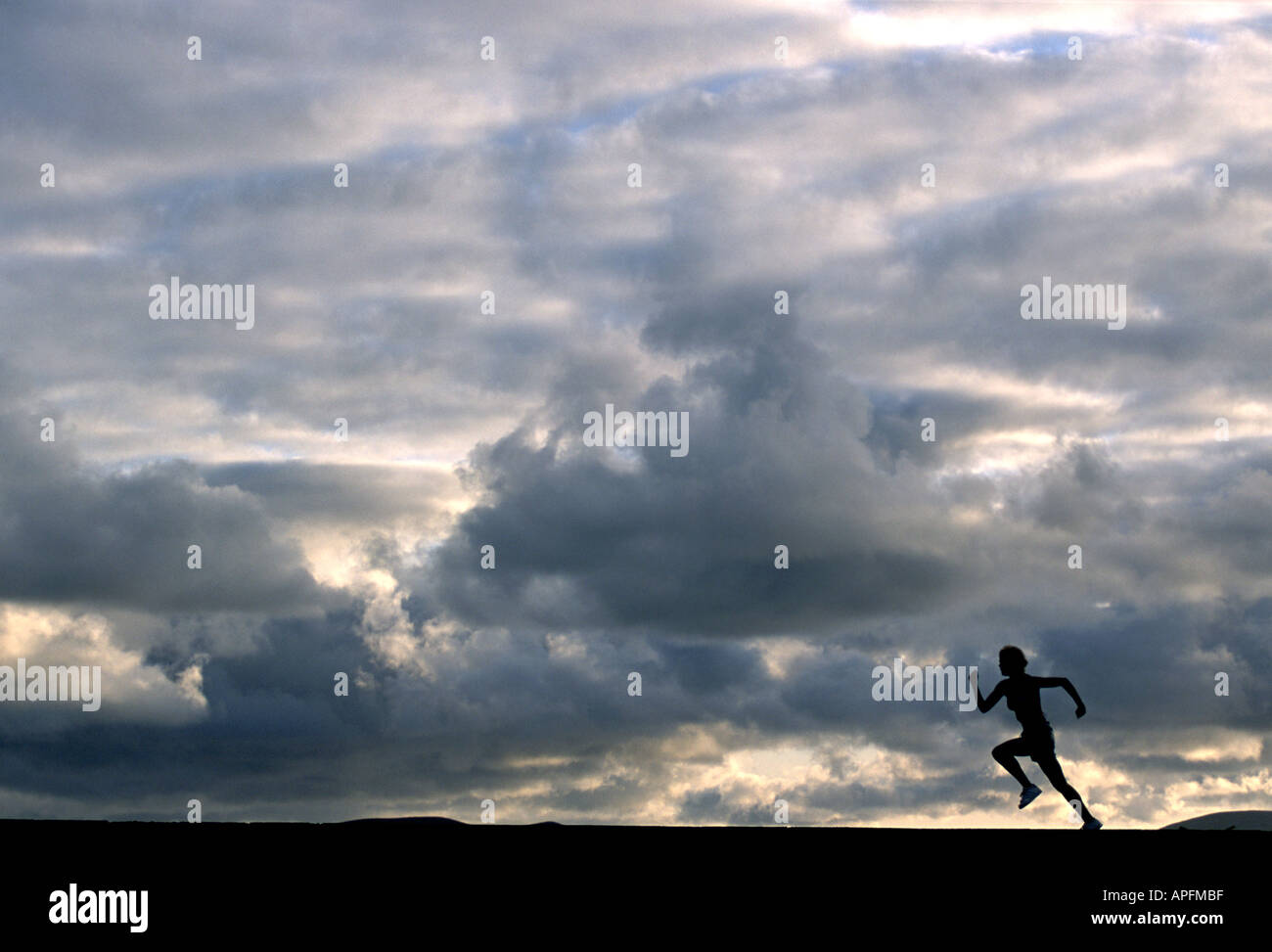 Woman silhouette running away hi-res stock photography and images - Alamy