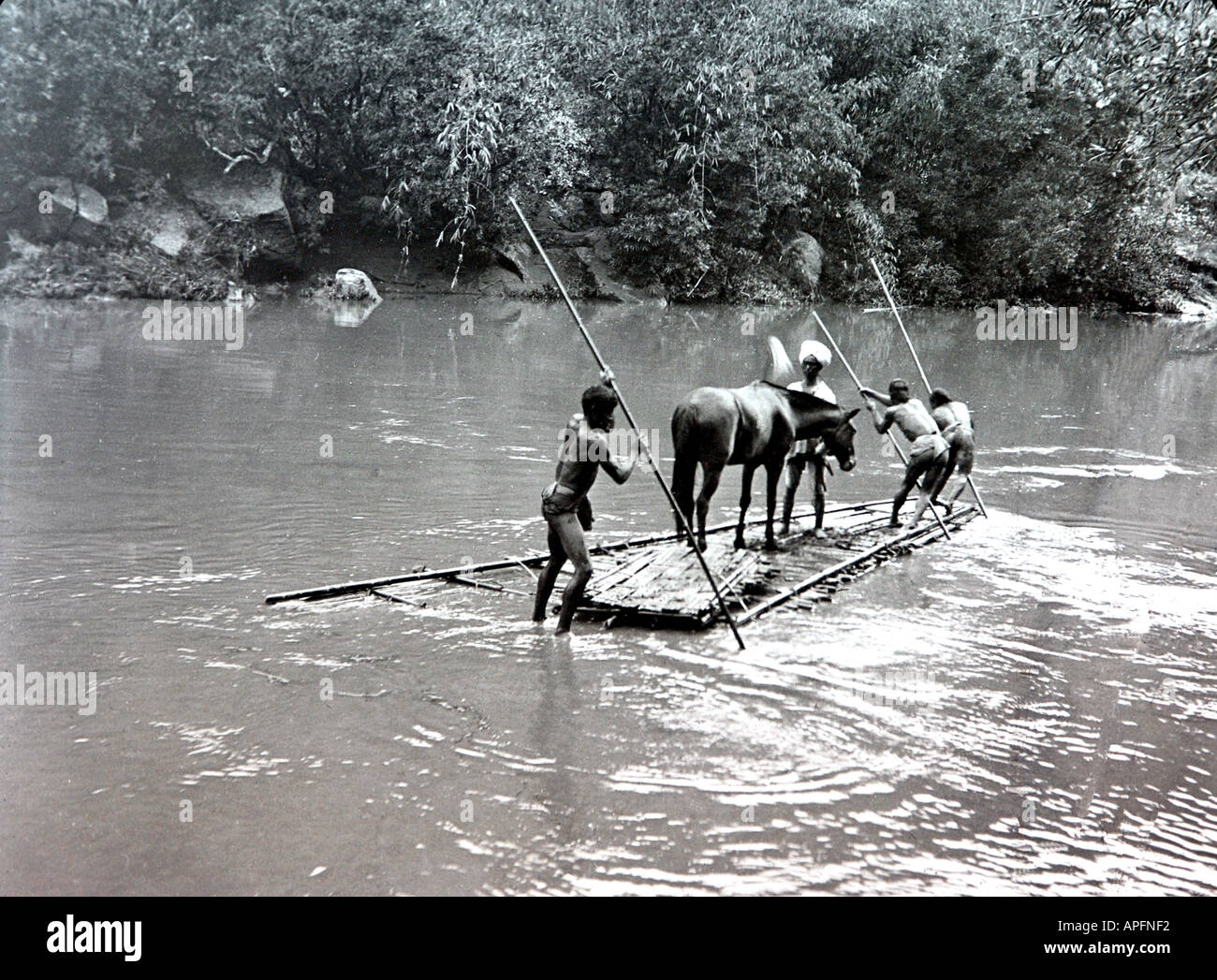 Indian Empire circa 1925 Naja Natives crossing the river by Raft www ...