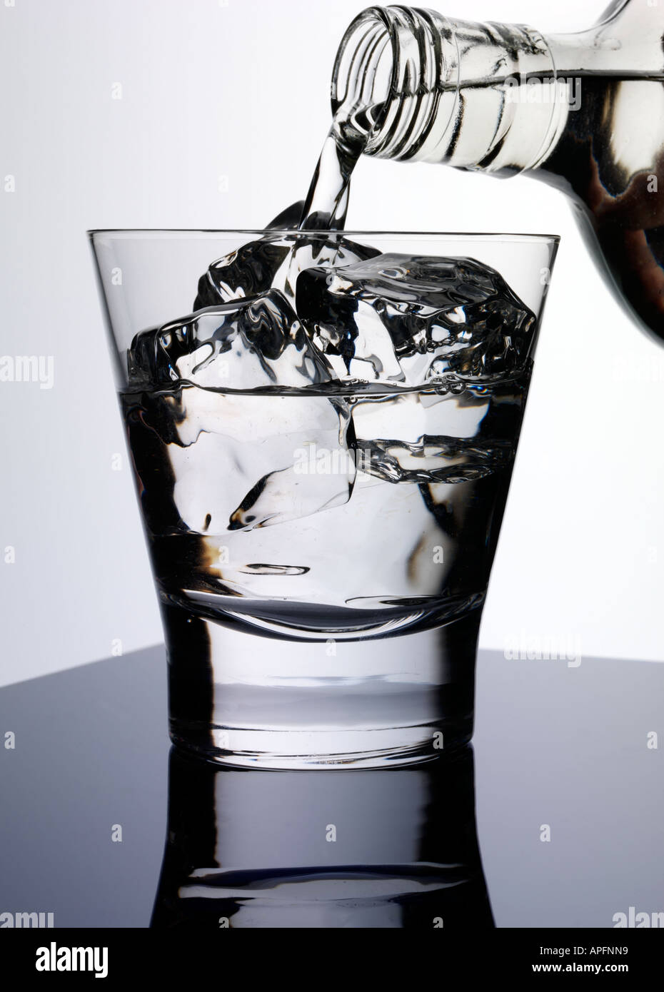 POURING GLASS OF GIN Stock Photo - Alamy