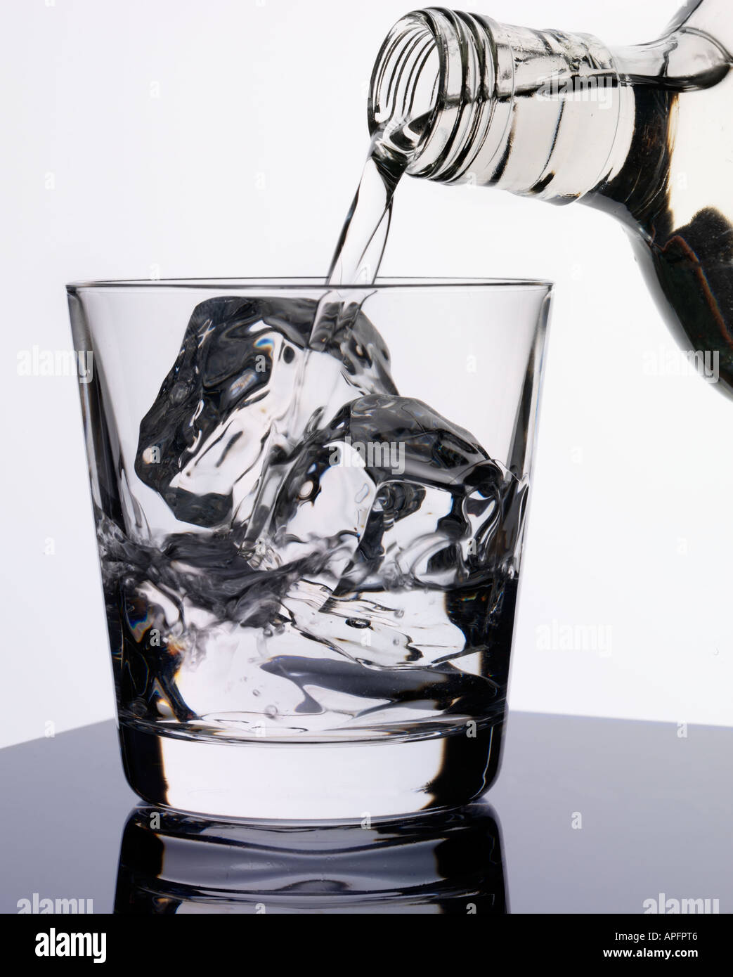 POURING GLASS OF VODKA Stock Photo - Alamy