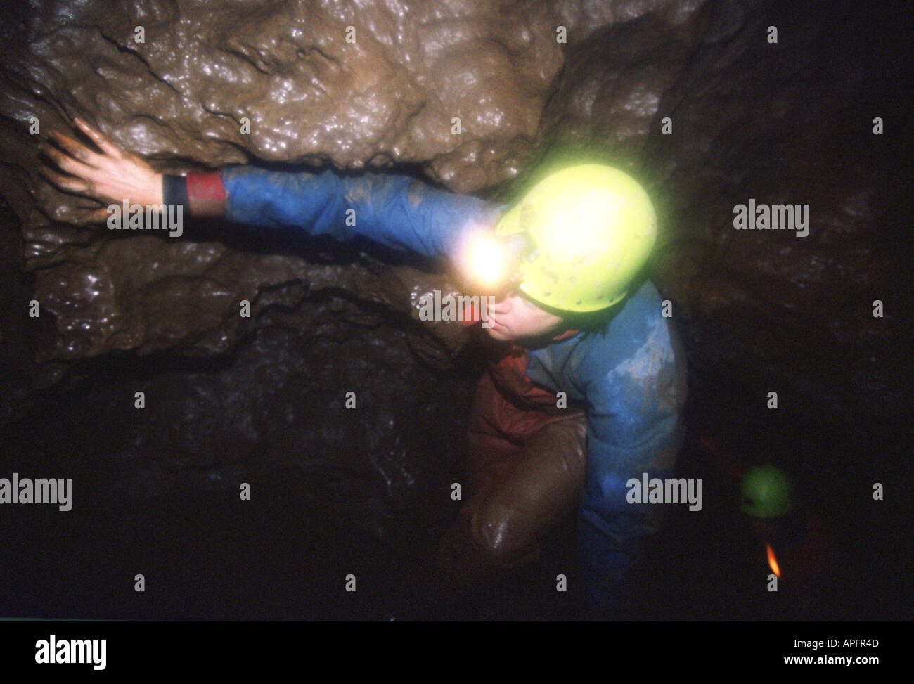 Caving in mud underground, Devon, UK Stock Photo - Alamy