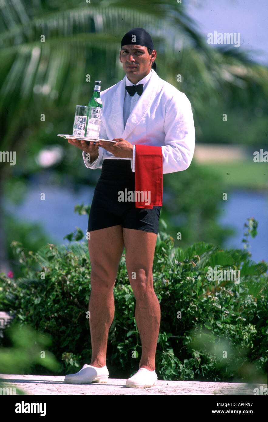 Waiter in shorts hi-res stock photography and images - Alamy