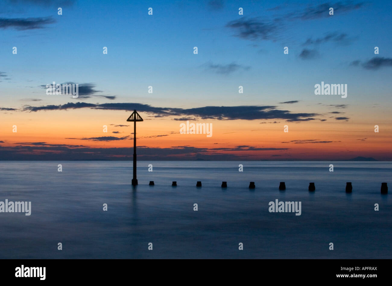 Breakwater on Borth Beach at Sunset Stock Photo - Alamy