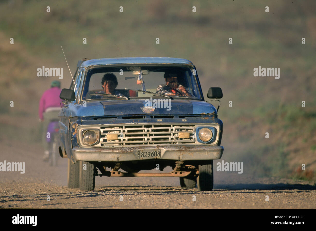 Mongolian car on dusty road Stock Photo - Alamy