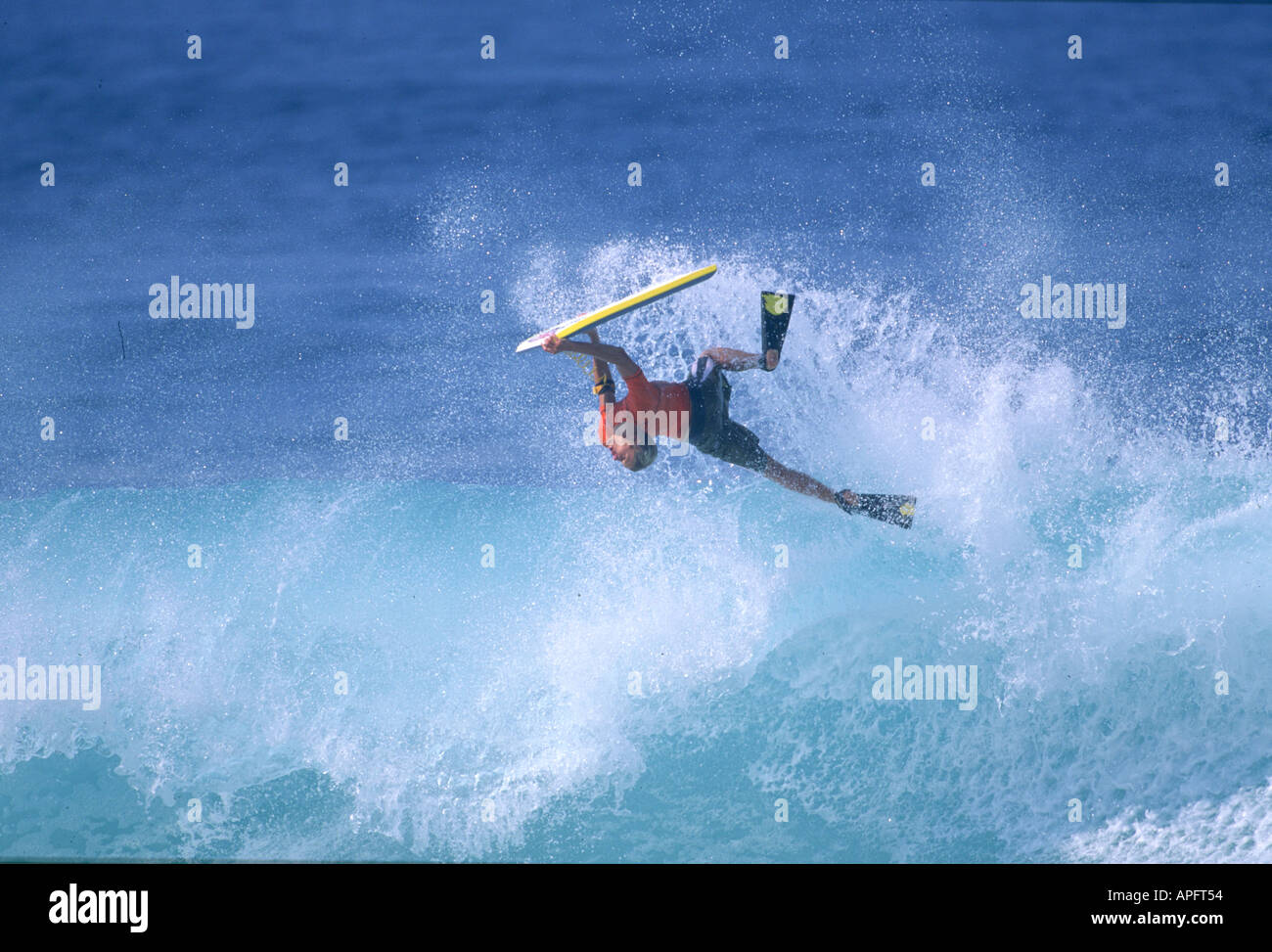 BOOGIEBOARDING ACTION HAWAII Stock Photo - Alamy