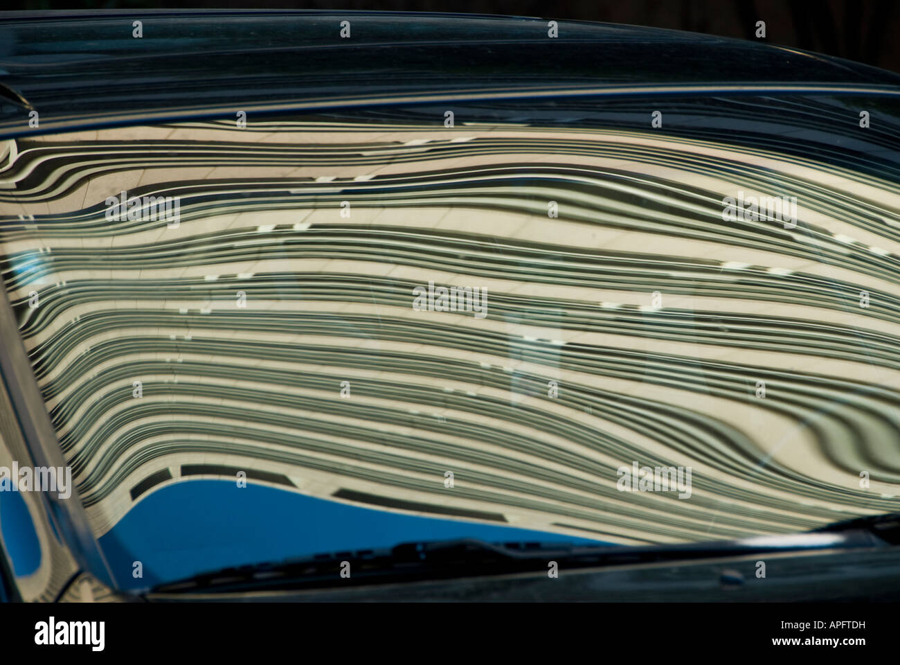 Reflection of office building in car windshield Los Angeles California ...
