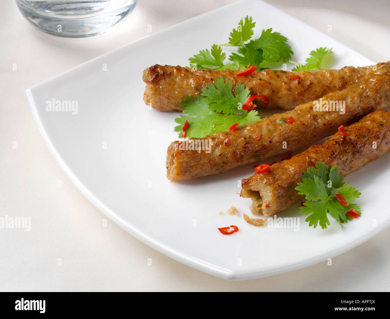 Minced chicken meat cylinders hi-res stock photography and images - Alamy