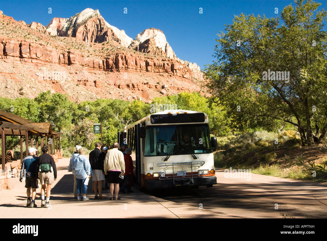 A propane fueled shuttle bus stops at the Visitor s Center in Zion ...