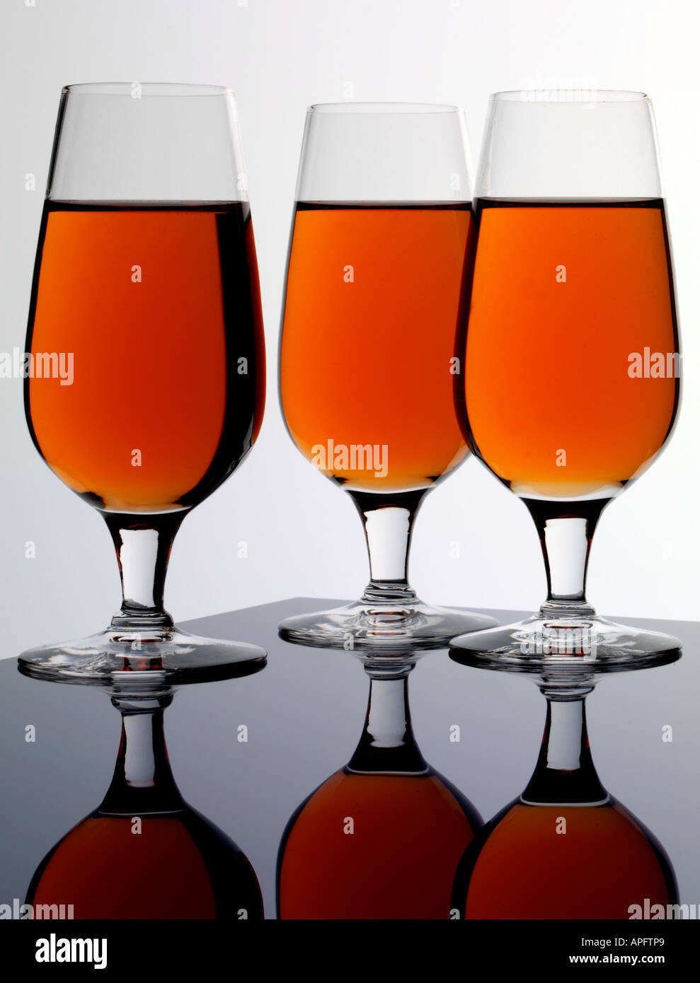 THREE GLASSES OF CALVADOS Stock Photo - Alamy