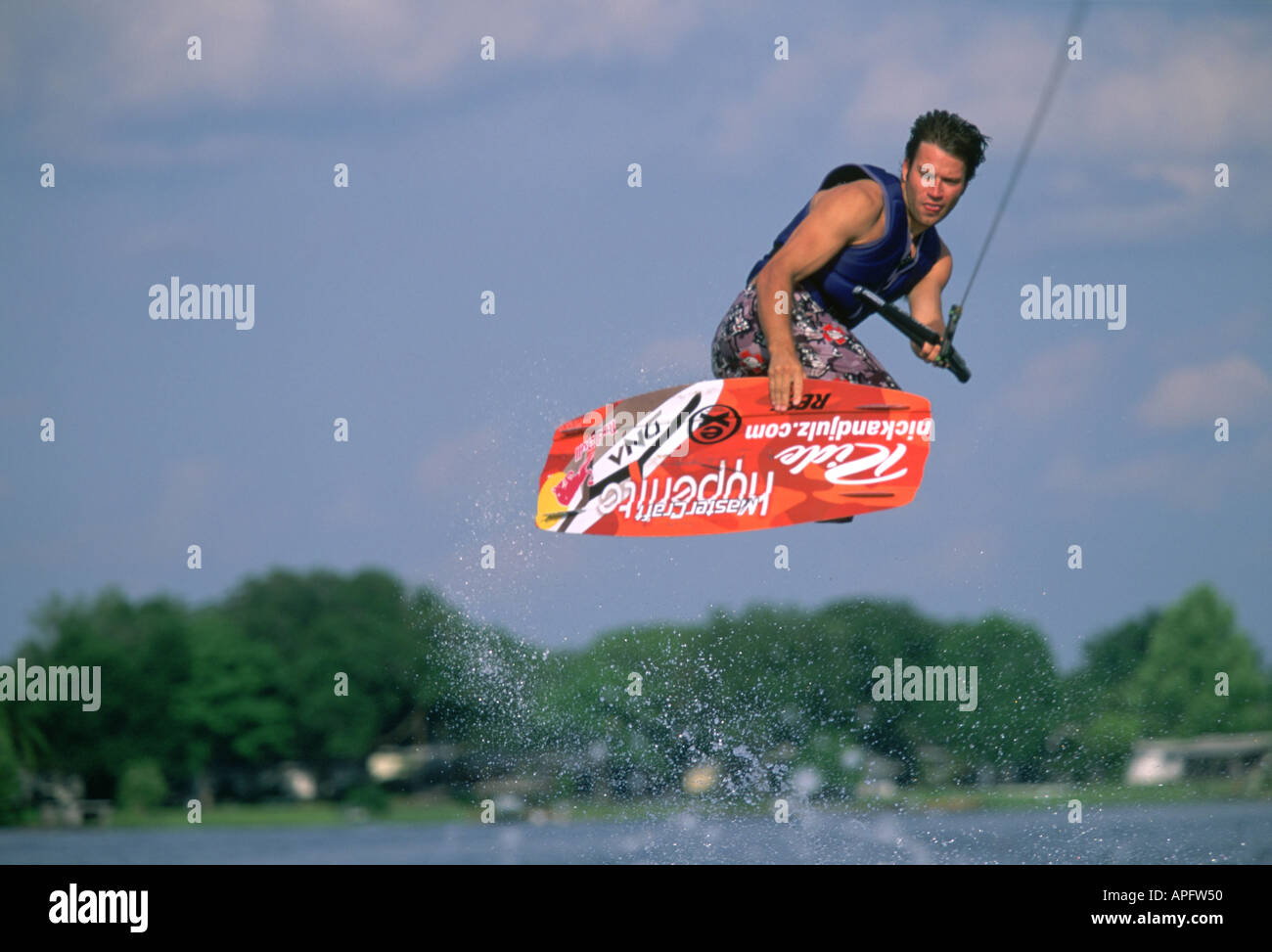 Jumping to grab rope hi-res stock photography and images - Alamy