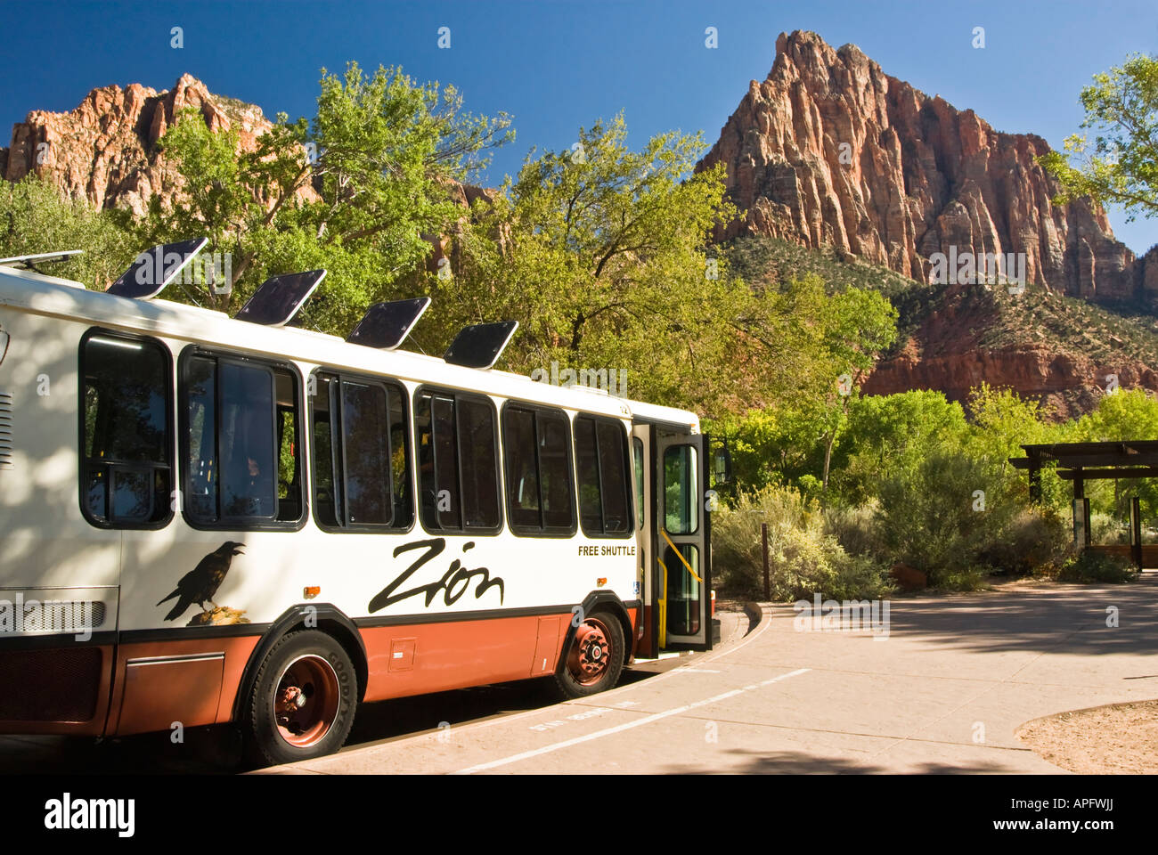 A propane fueled shuttle bus stops at the visitor s center in Zion ...