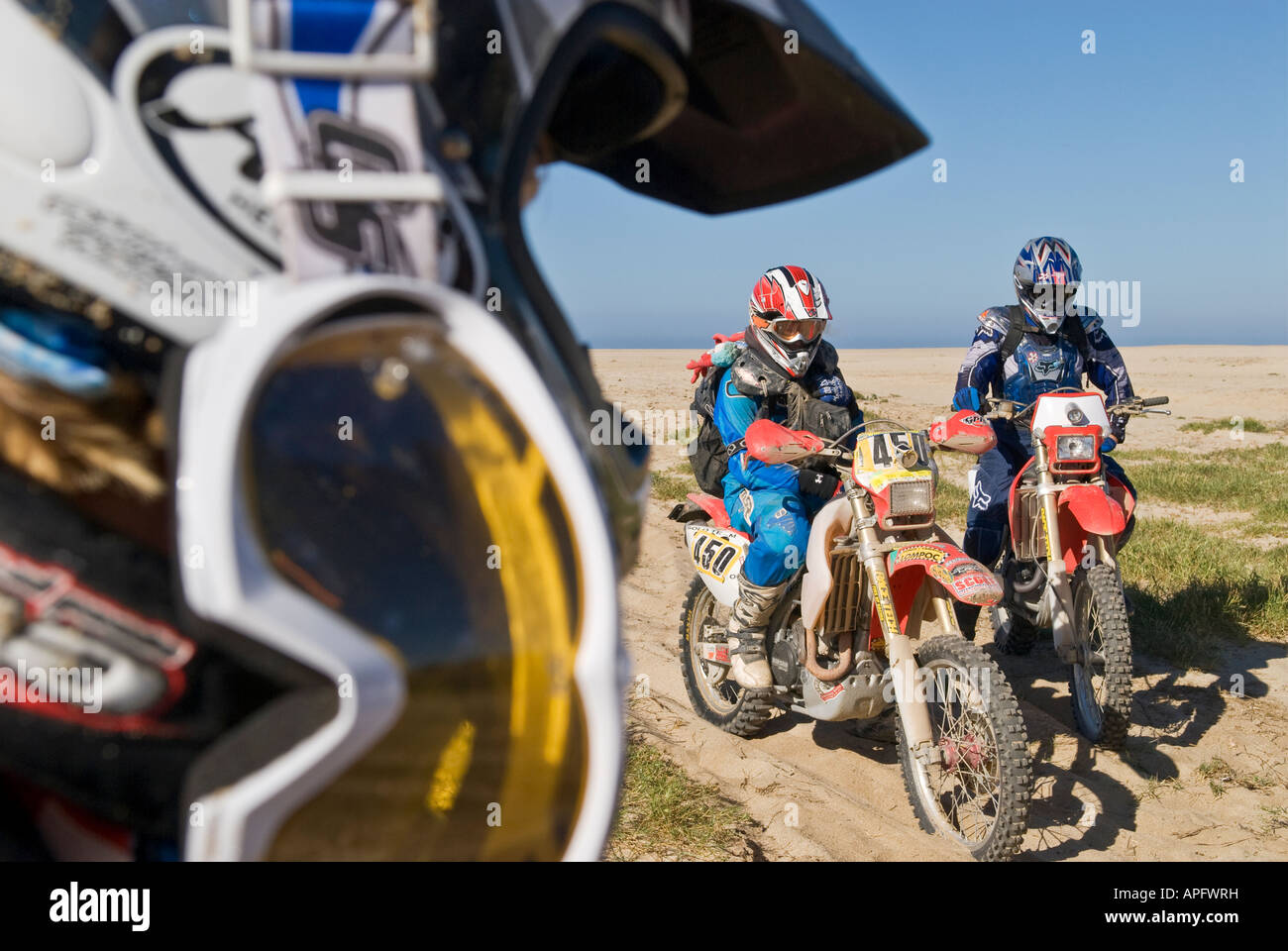 group of motorcycle riders on beach in Baja Mexico Stock Photo - Alamy