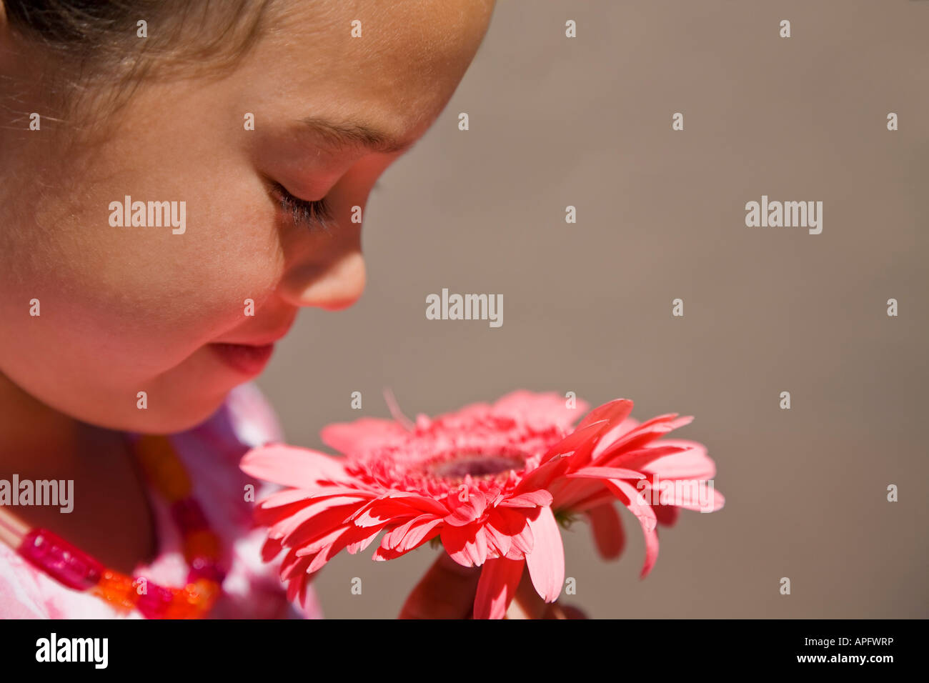 Child with flower Stock Photo - Alamy