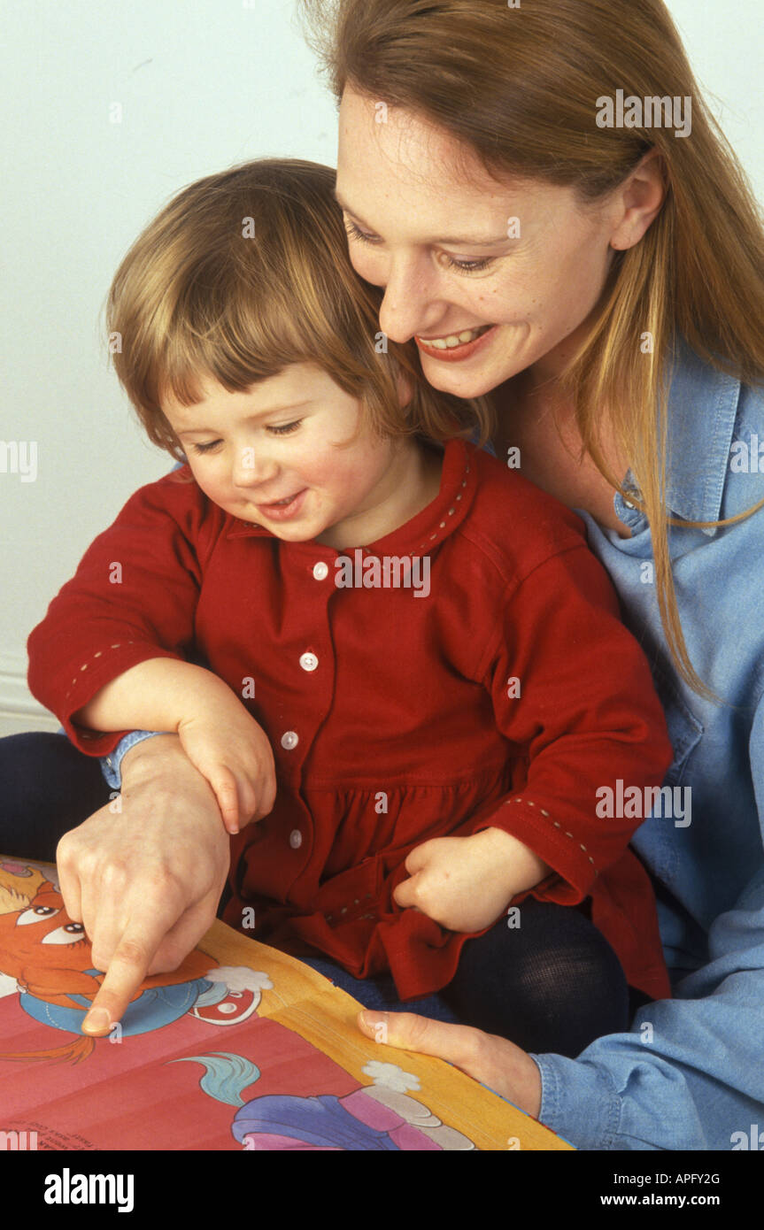 mother and child reading together Stock Photo - Alamy