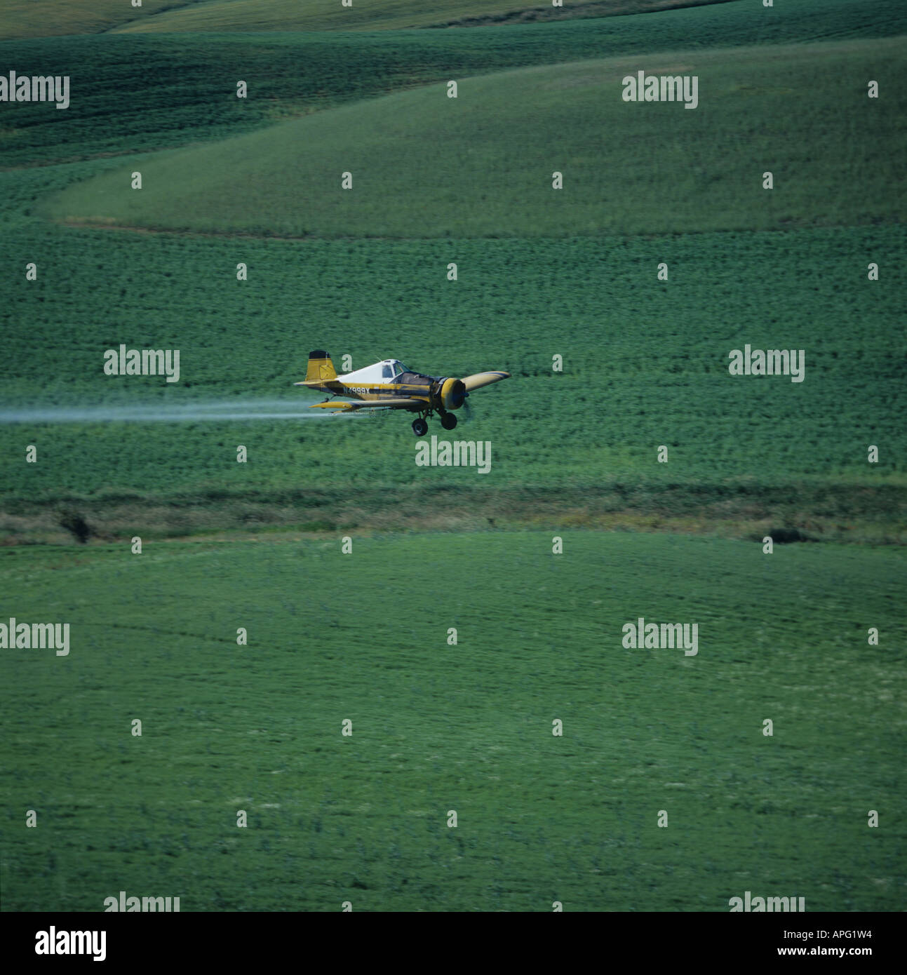Aerial spray aircraft spraying crops in the Palouse Western Idaho USA ...