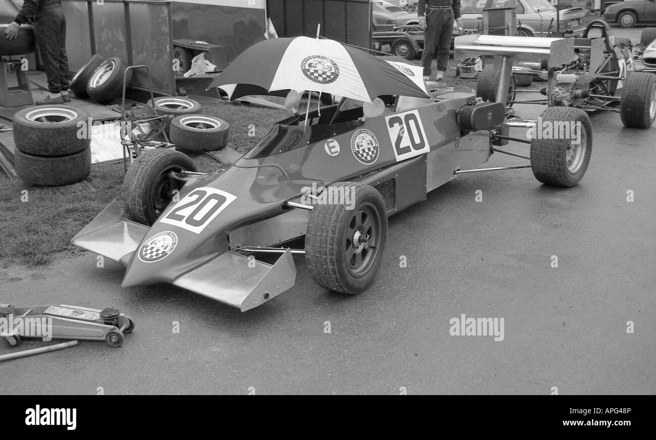 Single seat racing car ready to race with cockpit protected from hot ...