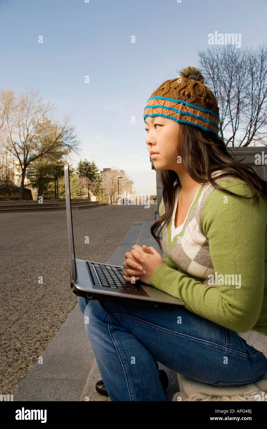 Student with laptop computer Stock Photo - Alamy