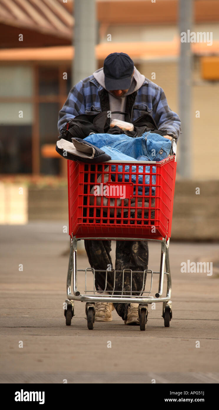 Homeless Man Pushing Shopping Cart High Resolution Stock Photography ...