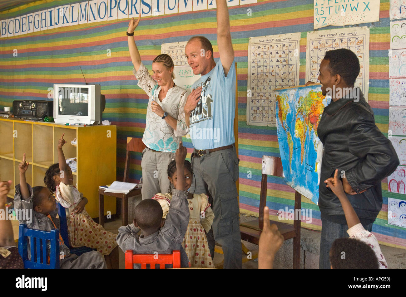 Poor african classroom and teacher hi-res stock photography and images ...