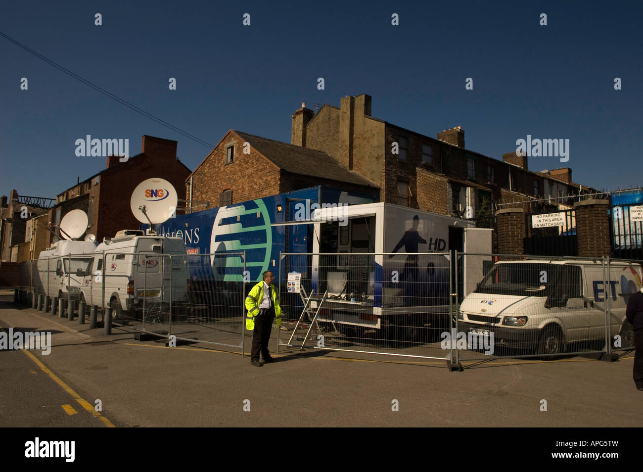 outside broadcast and satellite truck compound at Anfield Football ...
