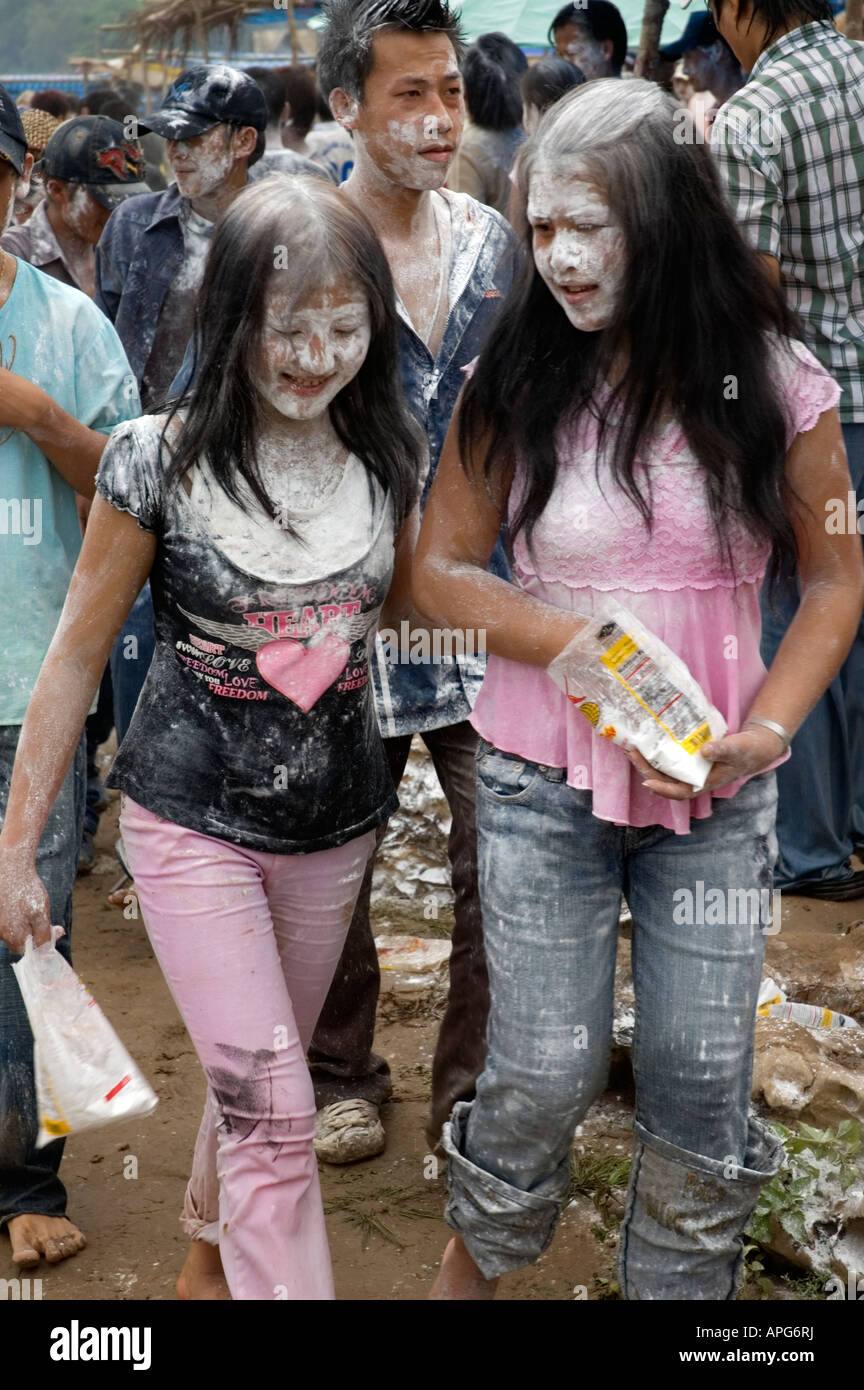 Two young women covered in flour during the New Year's party on the far ...