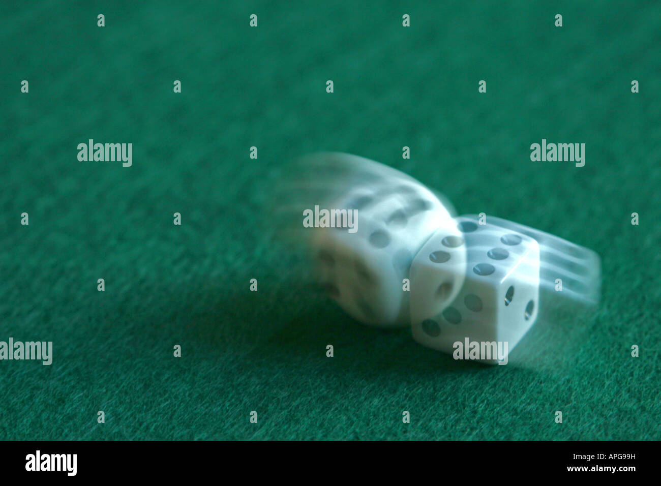 Pair of rolling dice Stock Photo - Alamy