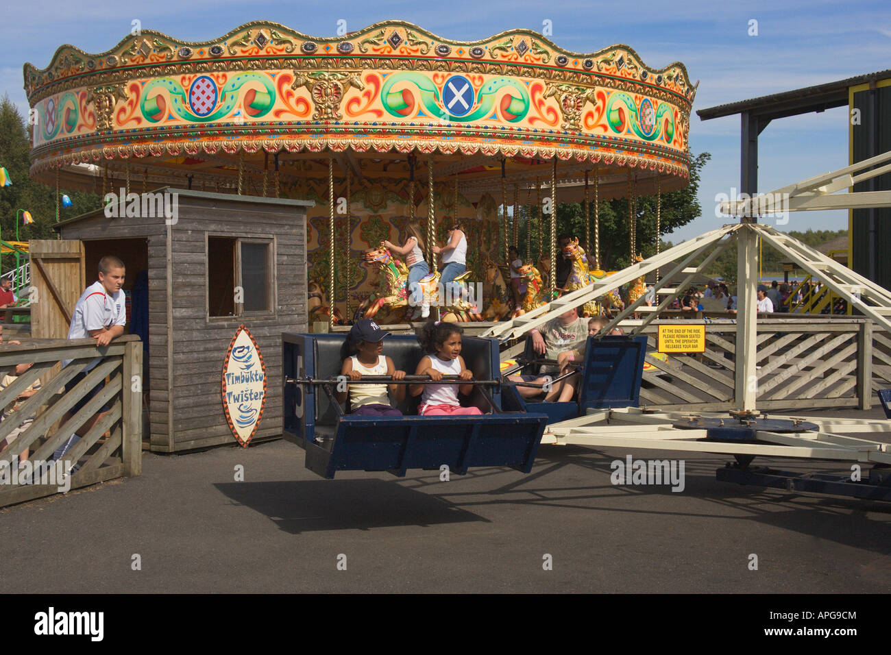 Children on a fairground ride Stock Photo - Alamy