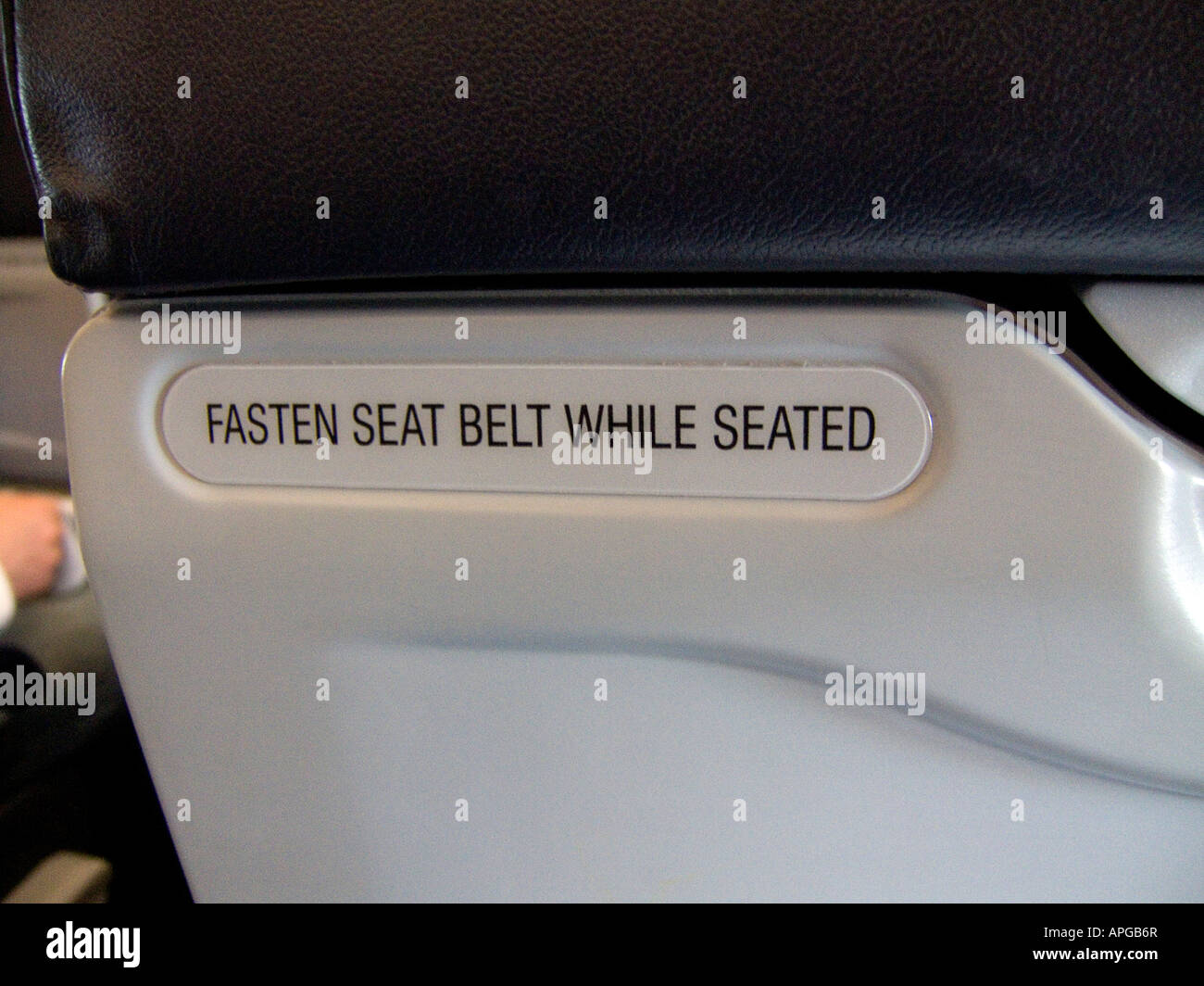Seatbelt sign airplane plane hi-res stock photography and images - Alamy