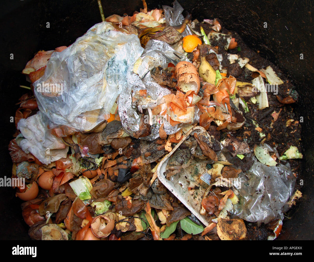 Biodegradable food and garden waste inside a plastic compost bin Stock ...