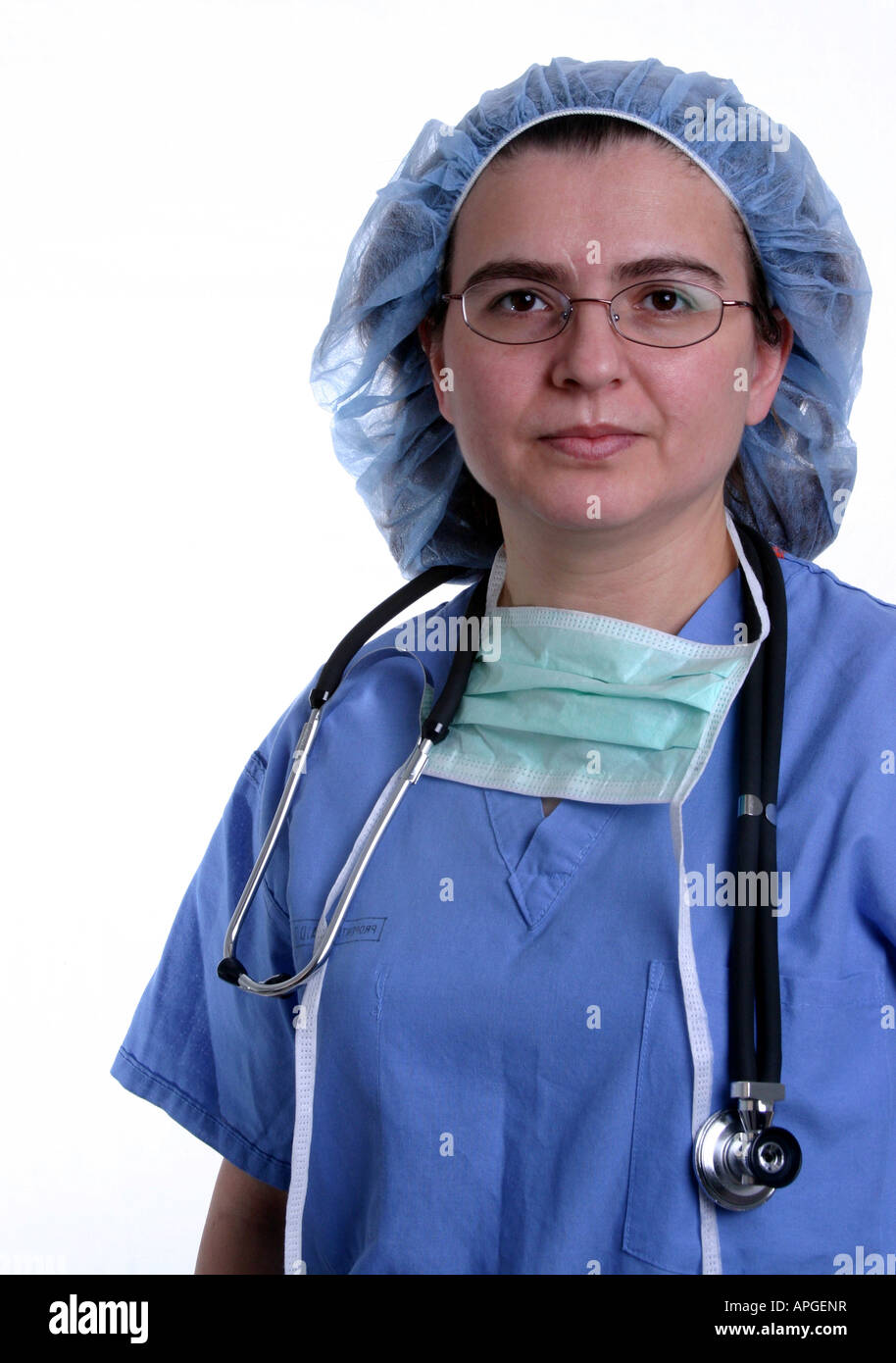 A nurse or surgeon wearing scrubs with surgical mask and stethoscope ...