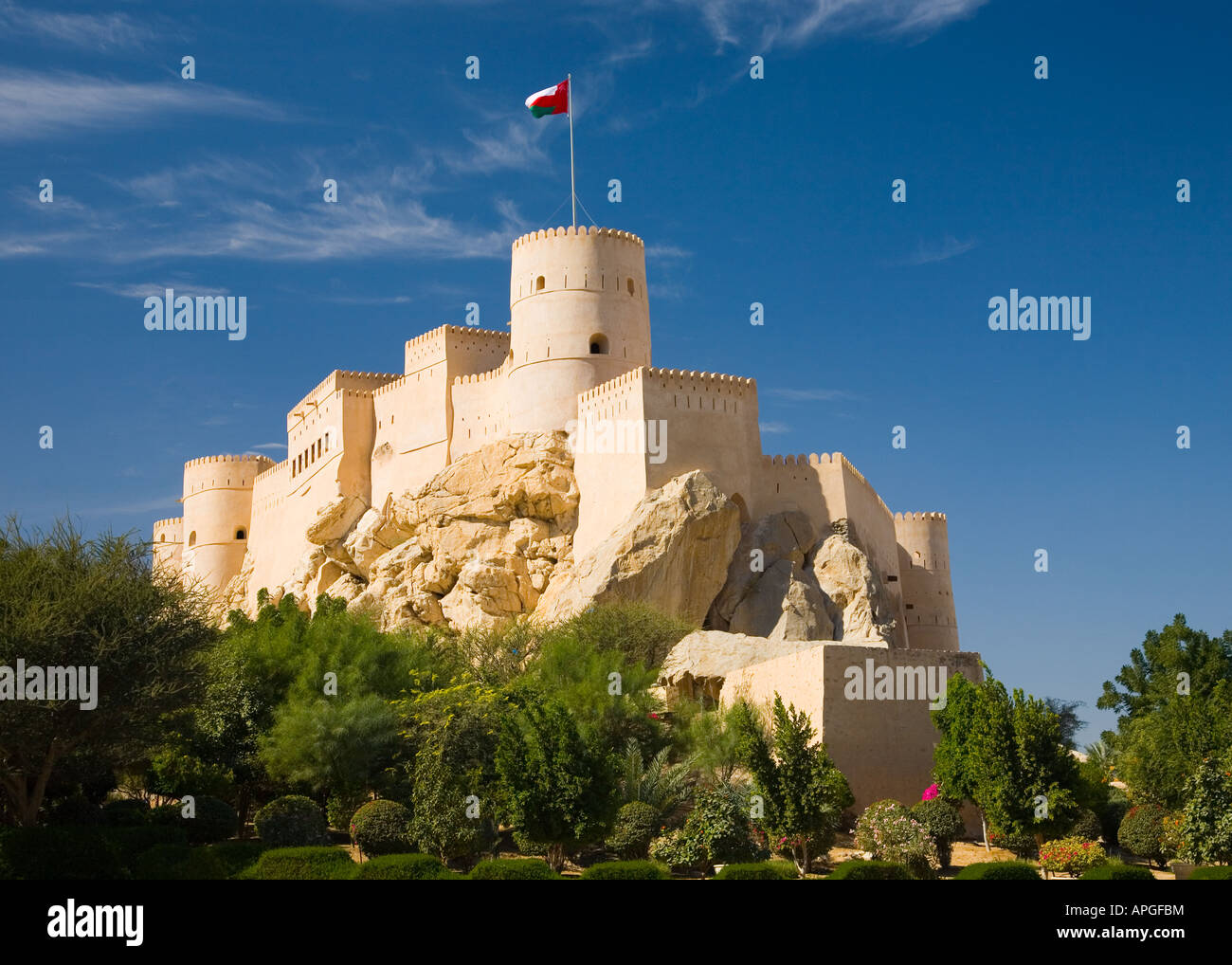Nakhal Fort in Oman flying the national flag Stock Photo - Alamy