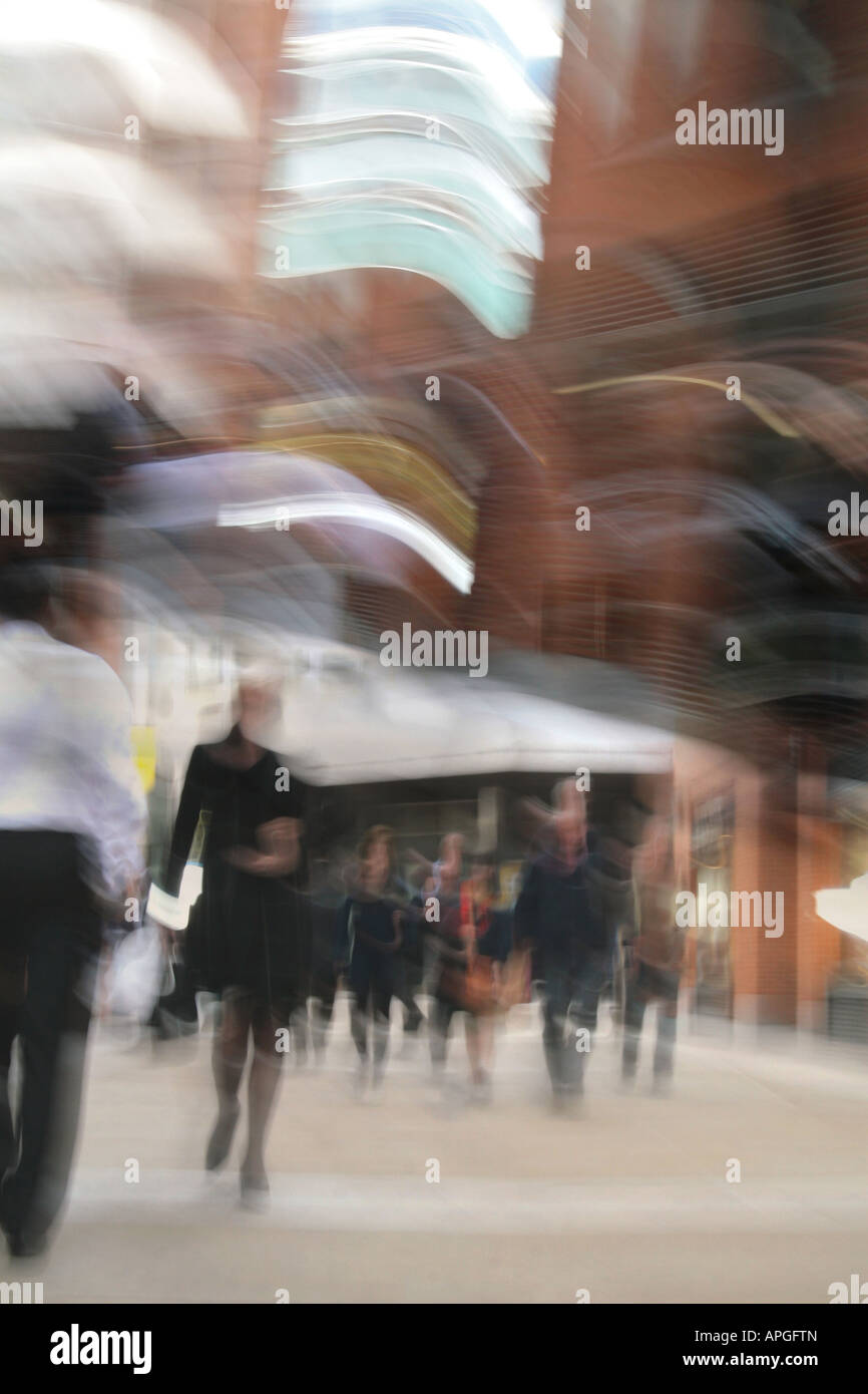 blurred figures shopping Stock Photo - Alamy