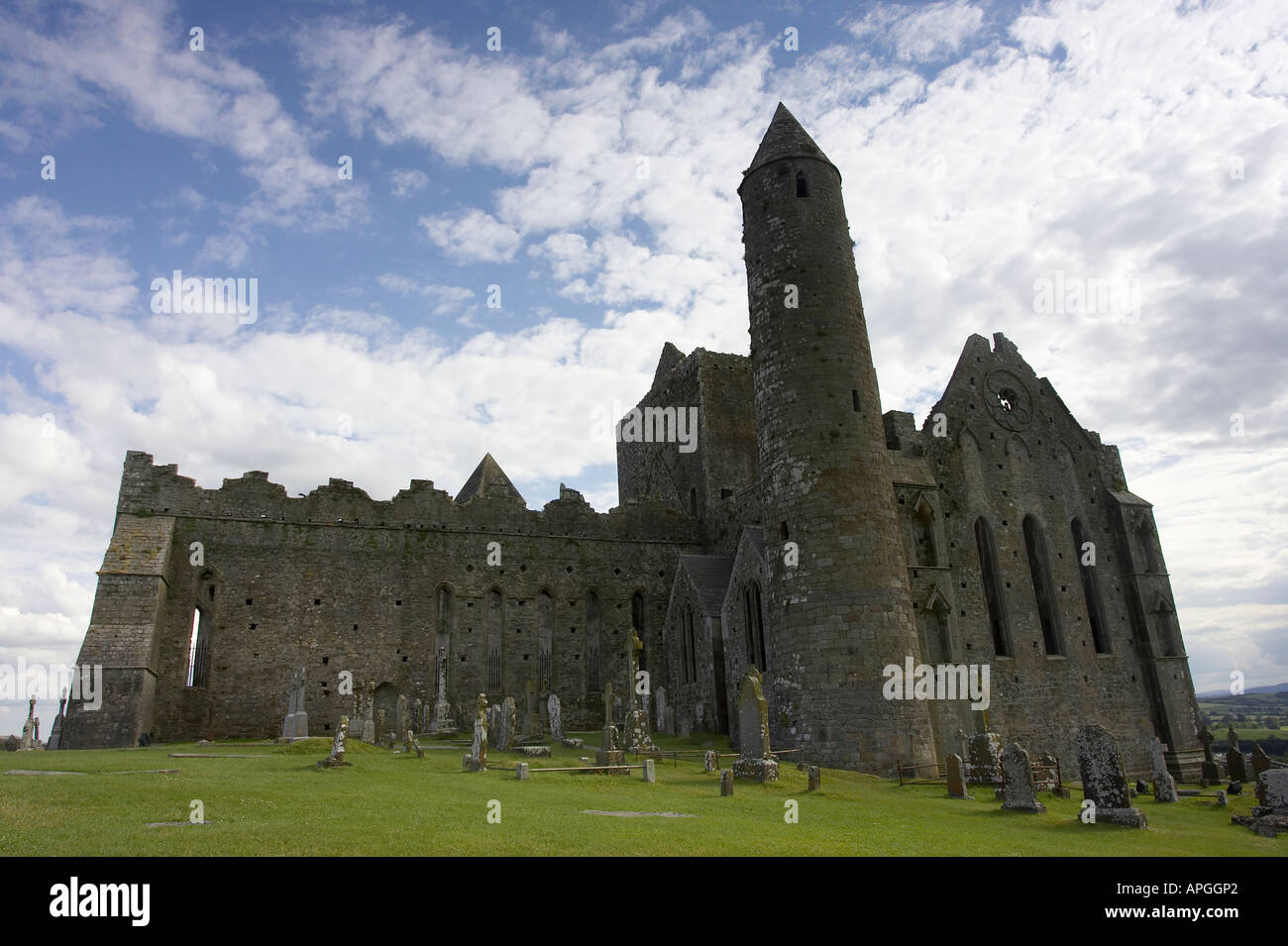 12th century round tower and 13th century cathedral against a blue ...