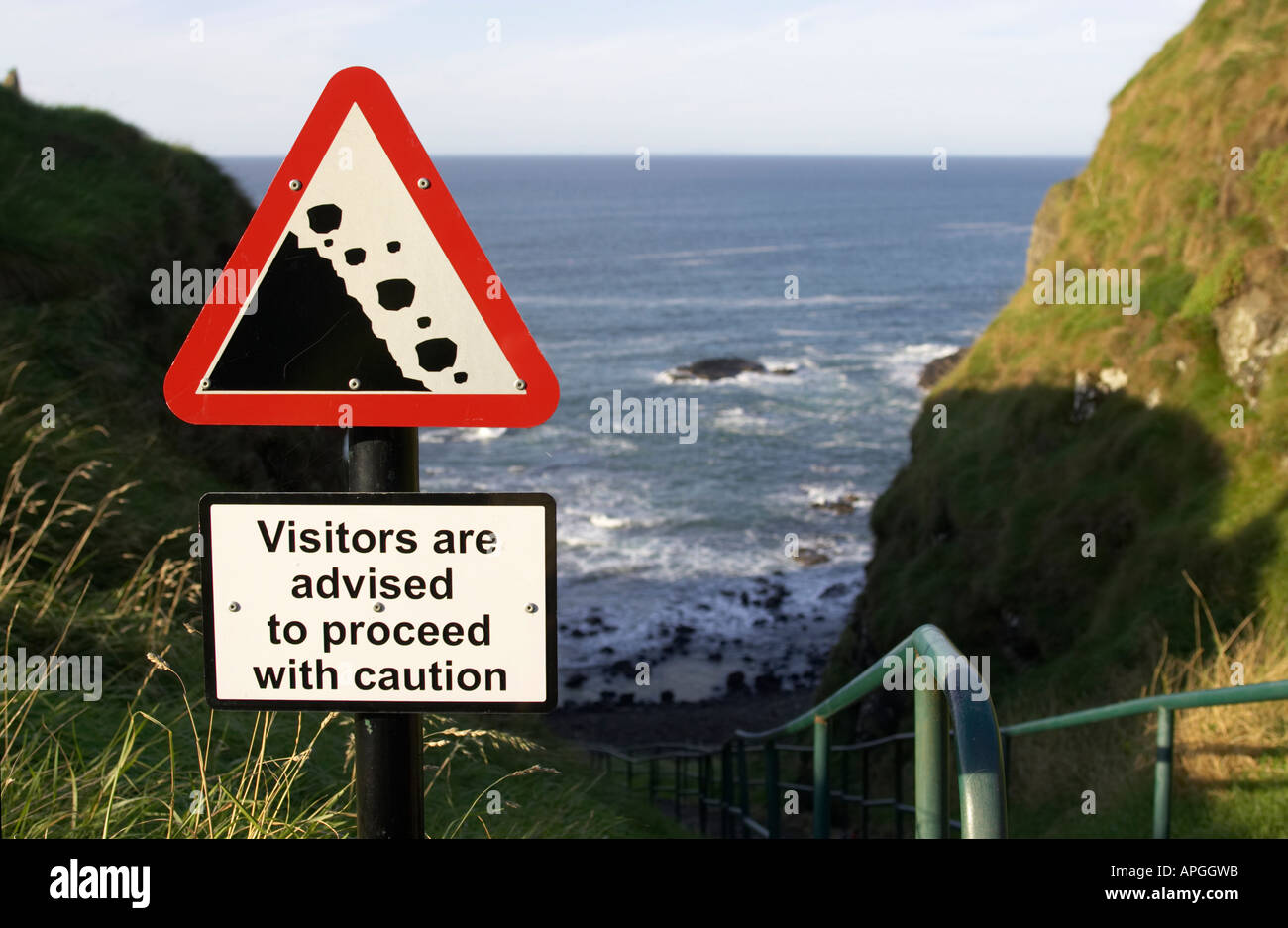 triangular red danger rocks falling road sign and visitors are advised ...