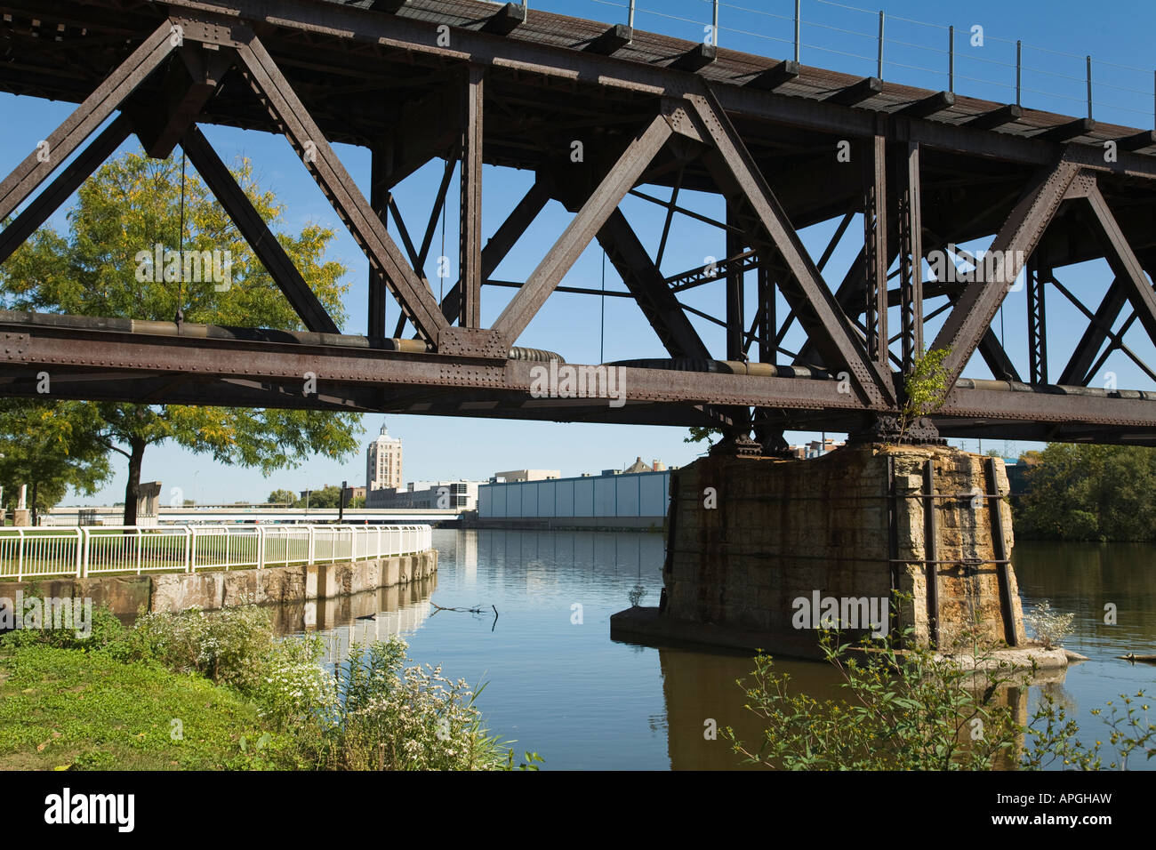 ILLINOIS Rockford Railroad bridge across Rock River riverfront walkway ...