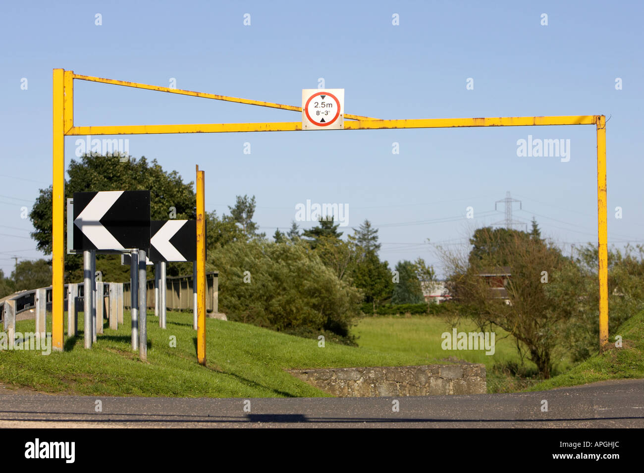 maximum height road sign above a yellow barrier to rural car park ...