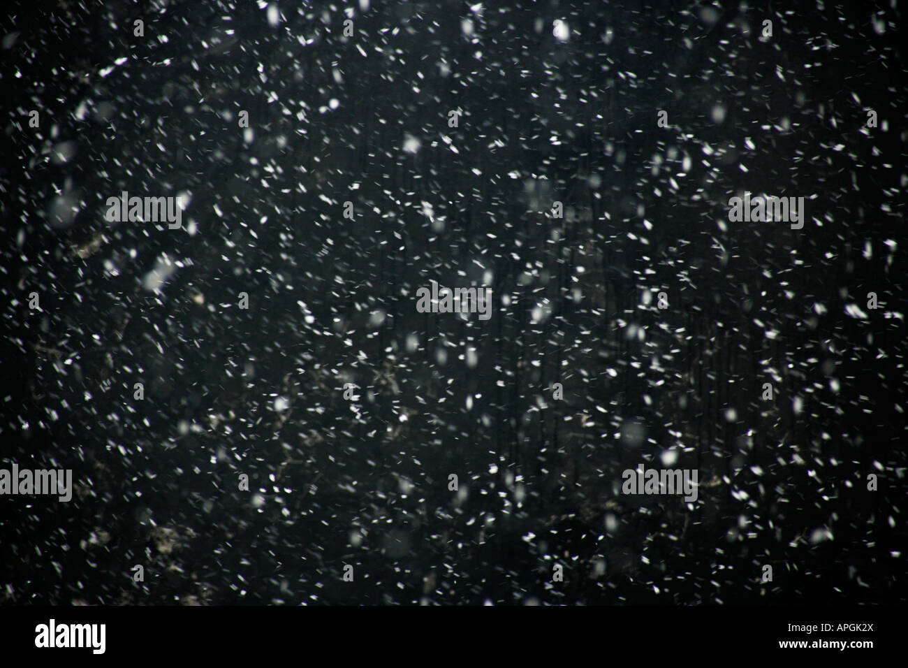 Snow against a black wall Stock Photo - Alamy