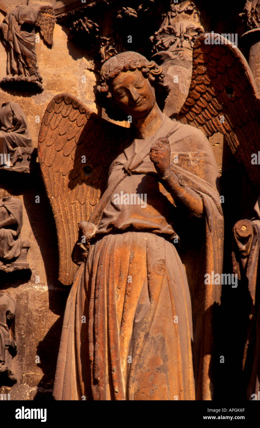 Cathedral of Reims angel smiling Stock Photo - Alamy