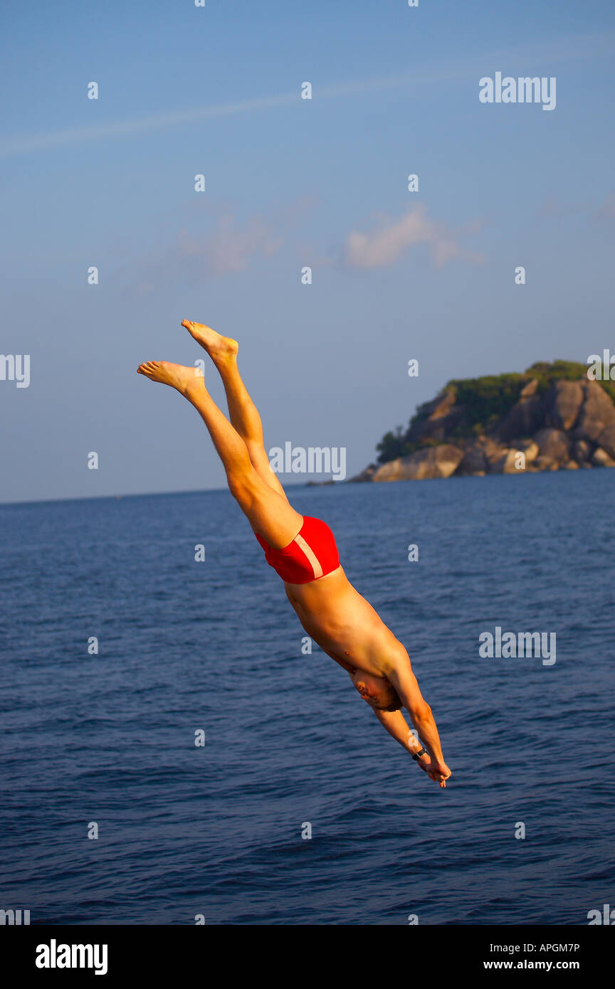 man diving into water for a swim Stock Photo - Alamy