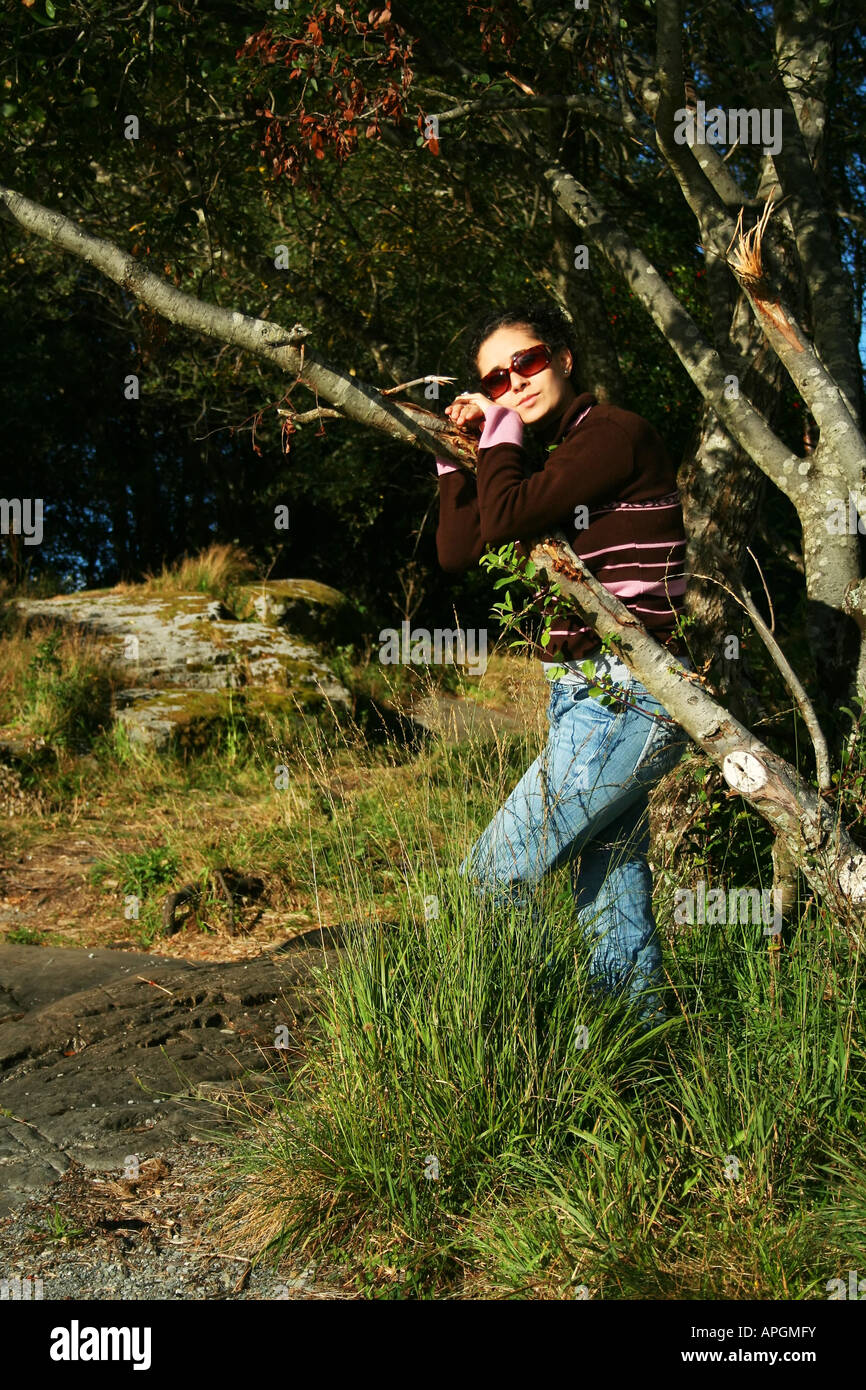 Leaning on a tree branch hi-res stock photography and images - Alamy