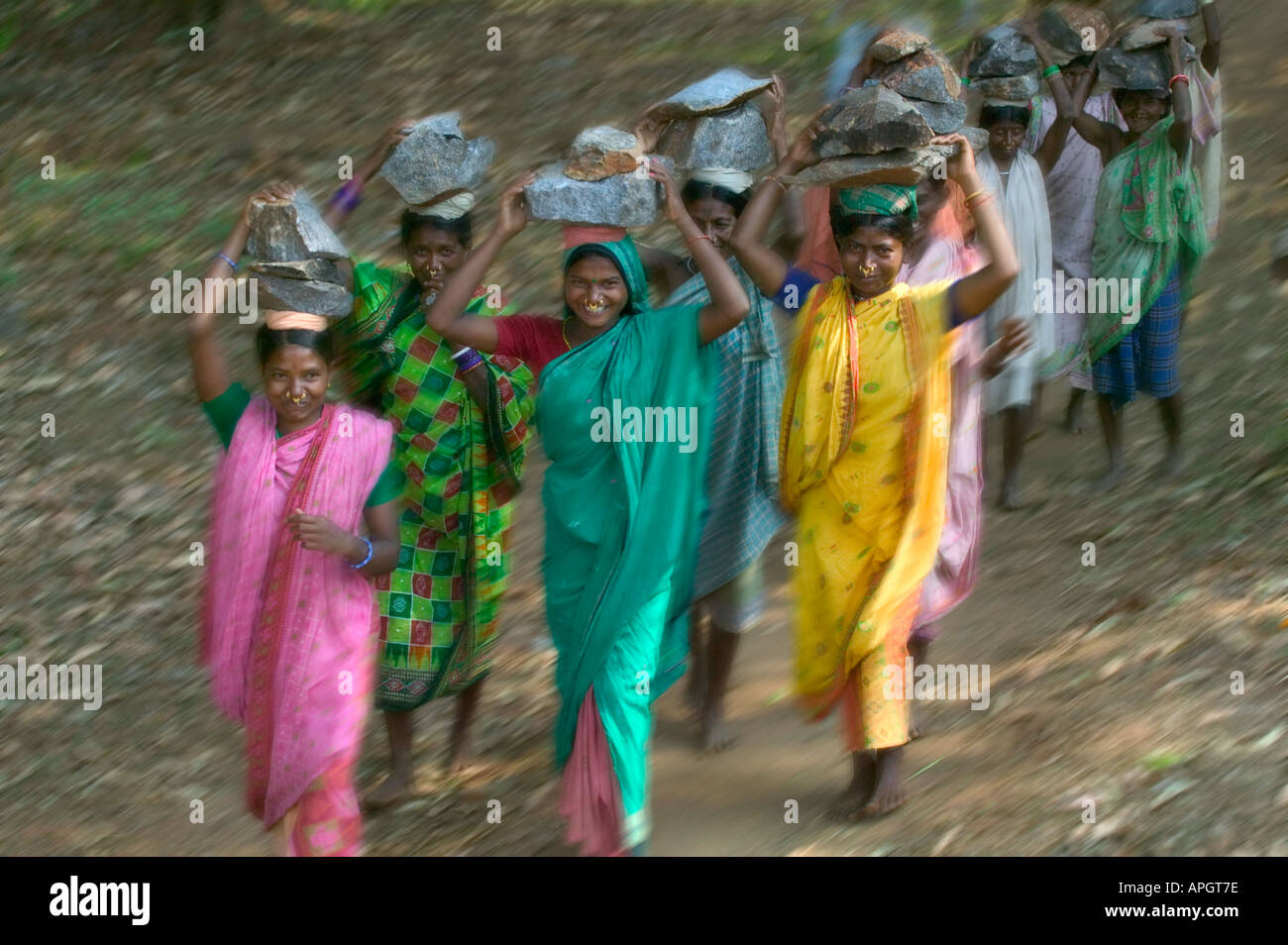 Women carry rocks on head for road construction Orissa India Stock ...